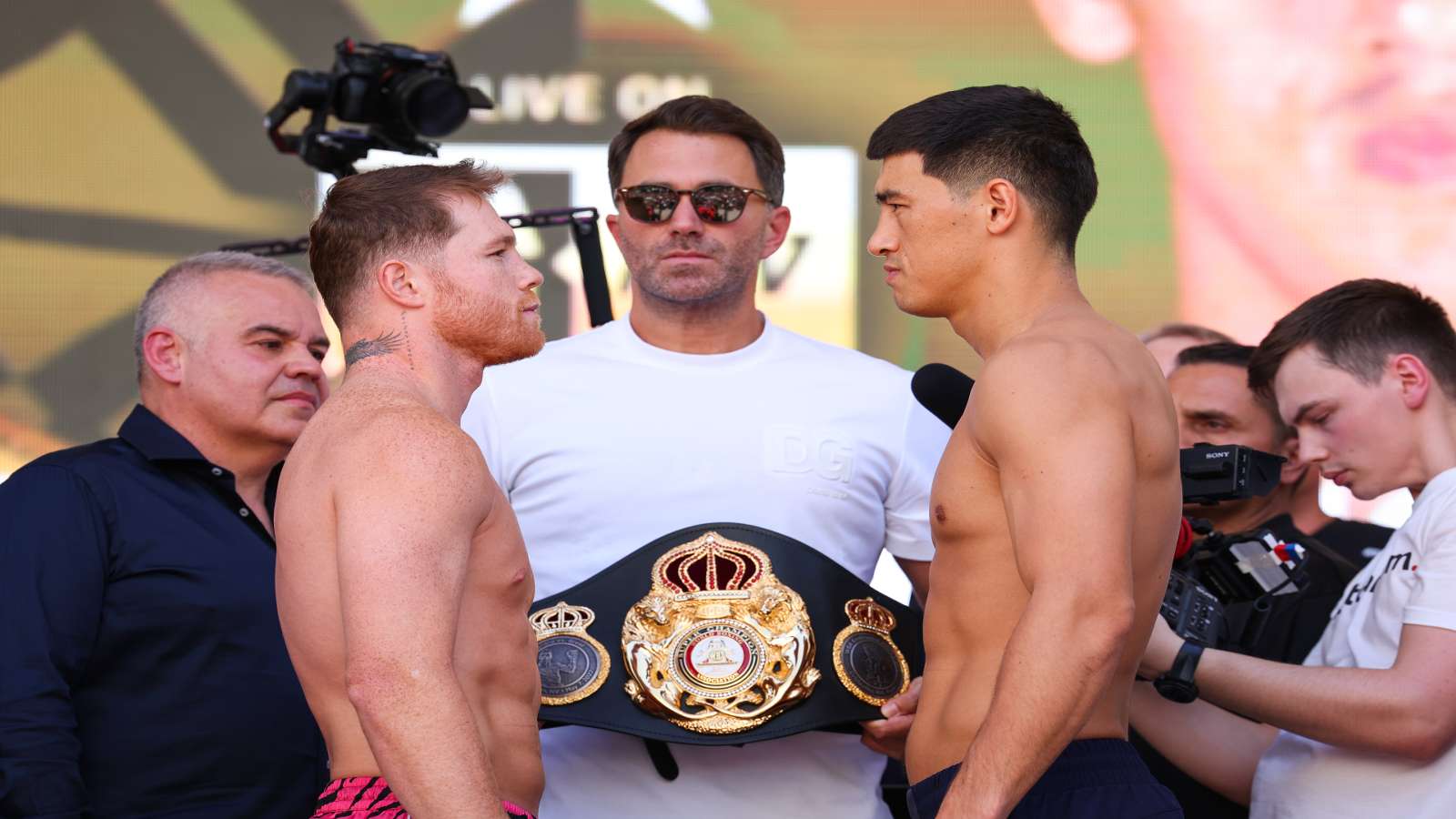 Canelo Alvarez, Dmitry Bivol easily hit weight to make light ...
