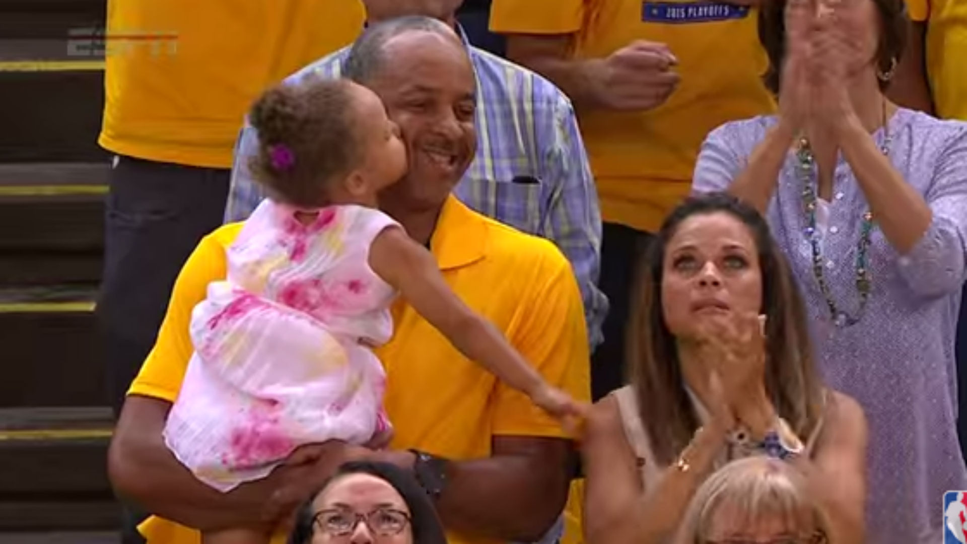 Riley Curry lays a big wet one on her grandpa Dell during Game 2 ...