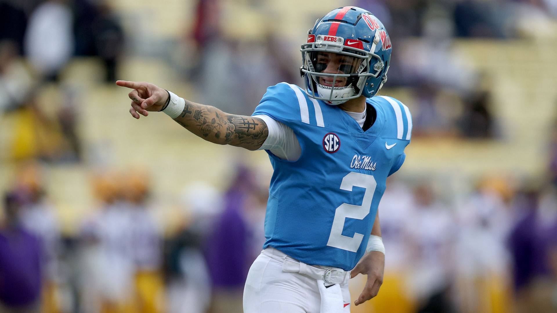 Ole Miss QB Matt Corral barrels over official on touchdown run ...