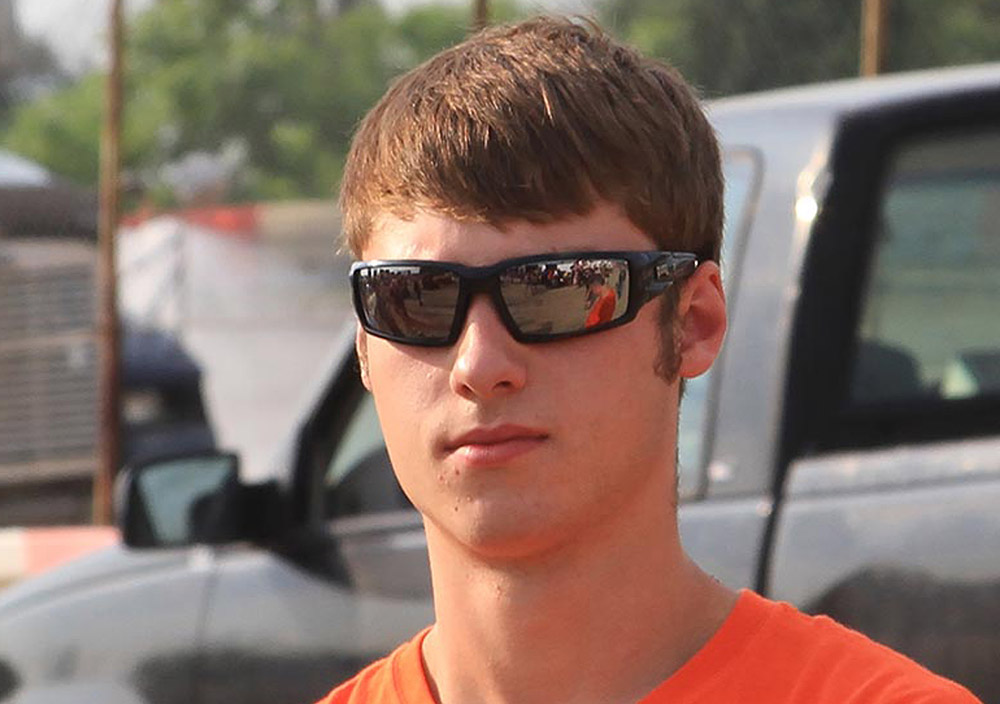 Mourners wear orange and black as they say goodbye to Kevin Ward Jr ...