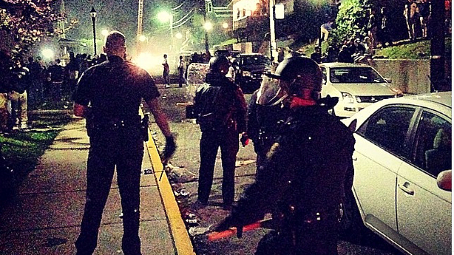 Police clash with rioting West Virginia supporters after upset of ...