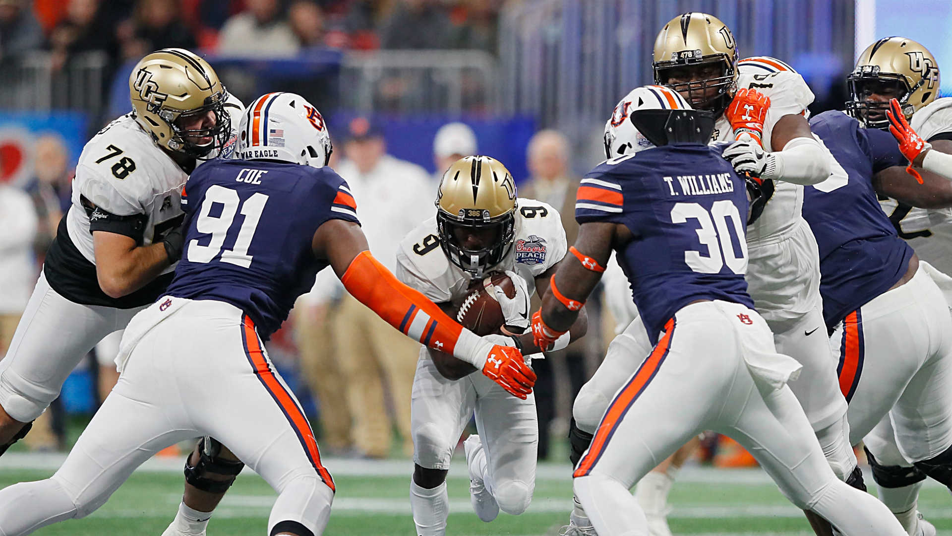 NCAA hoops coaches thankful to avoid College Football Playoff madness ...